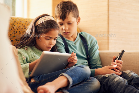 Digital after-school downtime Stock Photo by YuriArcursPeopleimages
