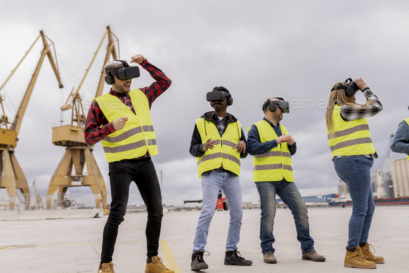 Enthusiastic Construction Workers Experiencing VR Technology Stock ...