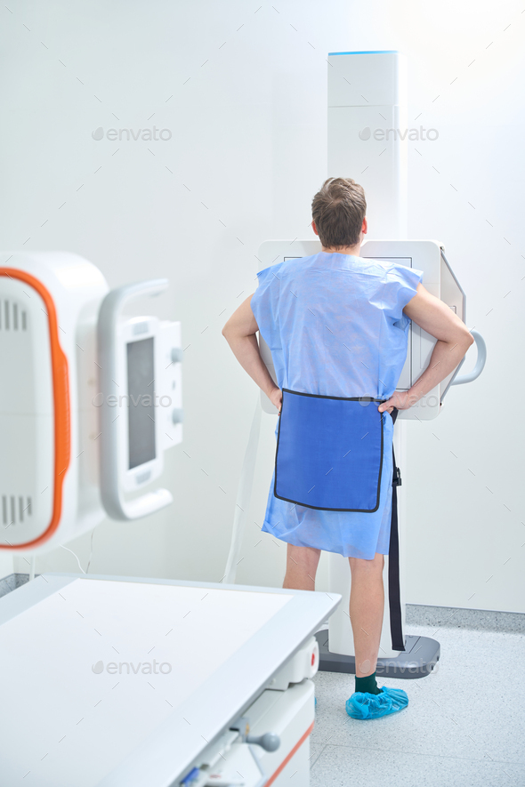 Adult man is undergoing digital chest x-ray examination Stock Photo by ...