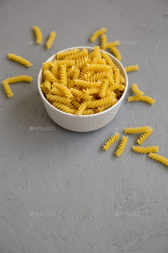 Uncooked Yellow Organic Rotini Pasta, side view. Copy space. Stock ...