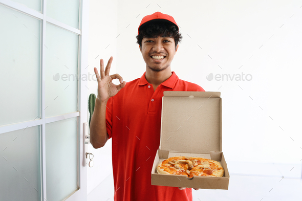 Pizza Delivery Man Showing Okay Sign Stock Photo by Garakta-Studio