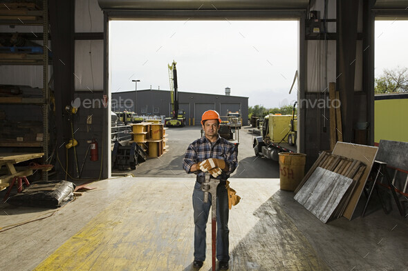 Construction worker ready for the day's tasks. Stock Photo by Image-Source