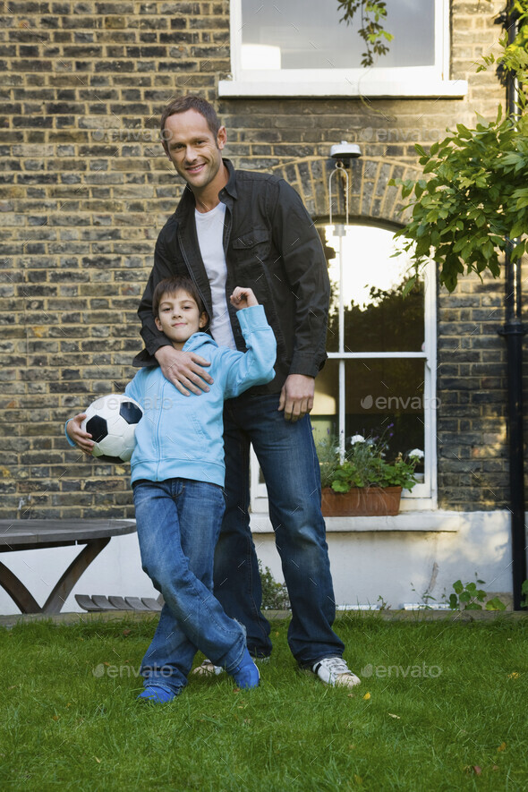 Father and son bonding time in the backyard Stock Photo by Image-Source