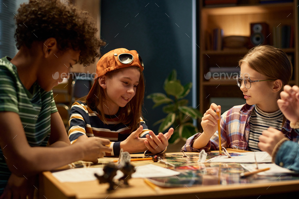 Group of kids choosing character roles Stock Photo by Pressmaster ...