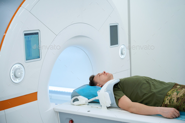Military patient prepared for upper extremity joint MRI Stock Photo by ...