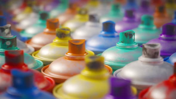 Multiple spray paint cans stacked in a pattern. Infinite looping ...