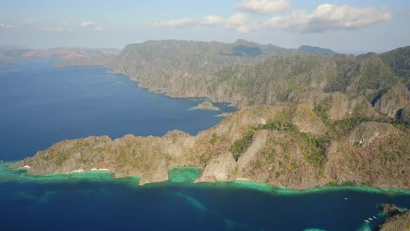 Banul Beach and Sunset Beach, Rocks in the coast of Coron Island ...