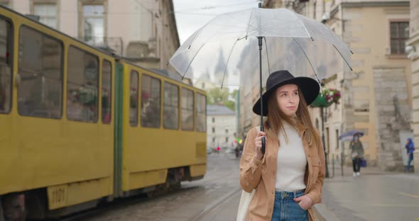 A Girl is Walking Slowly in the Rain, Stock Footage | VideoHive