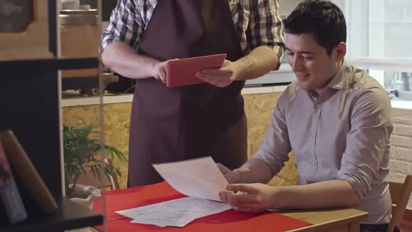 Man Making Order at Cafe, Stock Footage | VideoHive