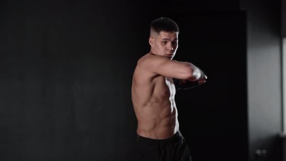 Young Fit Man Boxer Warming Up His Upper Body Before Training, Stock ...