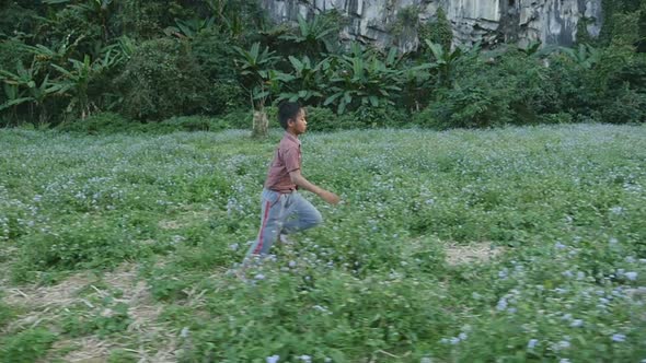 Sad Boy Running In Field, Stock Footage | VideoHive