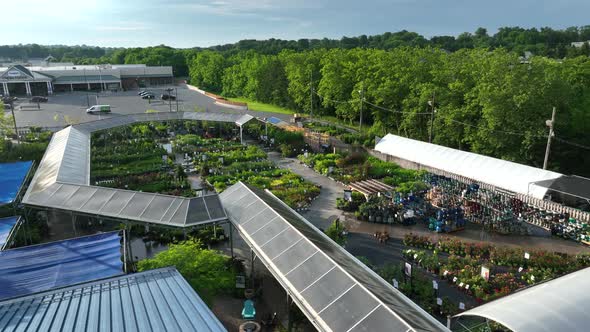 Outdoor greenhouse for flower shrubbery sales. Aerial view in USA ...