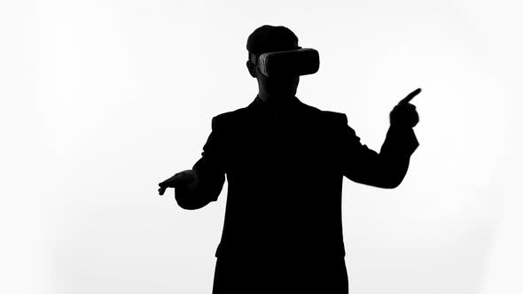 Businessman Scrolling Menu on Virtual Screen, Using Vr Headset ...