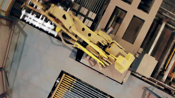 Top View of a Robotic Machine Relocating Products at Modern Factory ...