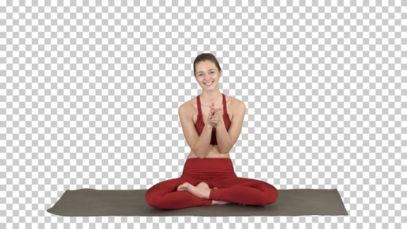 Positive cheerful young female in yoga pose clapping hands, Stock Footage