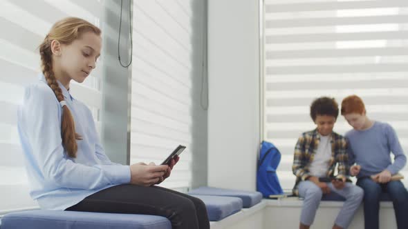 Pupils Using Gadgets during Break, Stock Footage | VideoHive