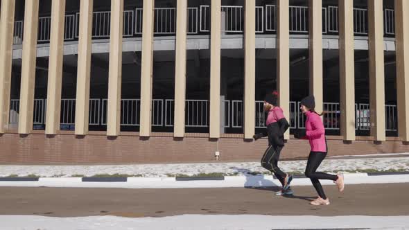 Fit Couple Jogging Around Building in City, Stock Footage | VideoHive