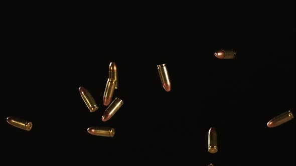 Bullets falling bouncing in ultra slow motion 1500fps on a reflective ...
