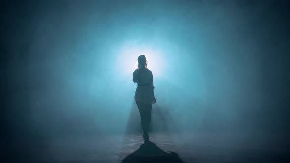 Woman dancing in the fog, Stock Footage | VideoHive