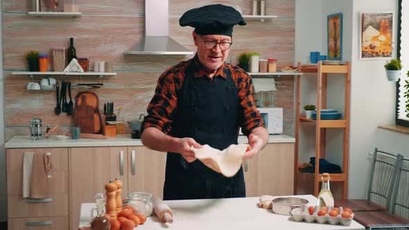 Chef in Uniform Spinning and Tossing Pizza, Stock Footage | VideoHive