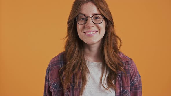 Redhead Adolescent Girl in Checkered Shirt and Glasses, Stock Footage