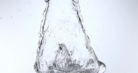 Water Spurting out against White Background, Slow Motion 4K, Stock Footage