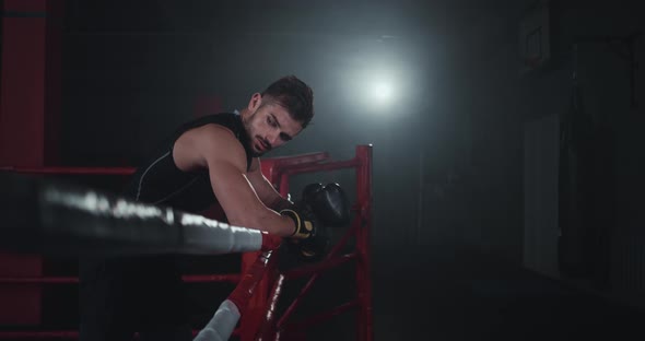 In a Boxing Ring Athletic Man Have a Break Time, Stock Footage | VideoHive