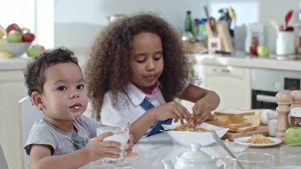 Child Making Mess at Dinner, Stock Footage | VideoHive