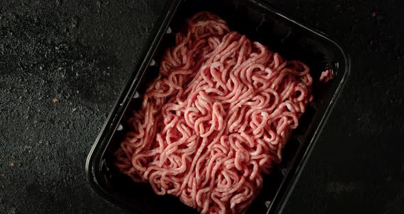 Raw Minced Meat in the Box on the Table Slowly Rotates , Stock Footage