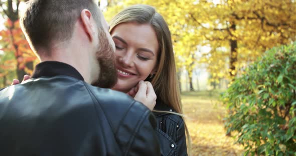 Macho Caresses And Kisses His Girlfriends While They Stand Together In