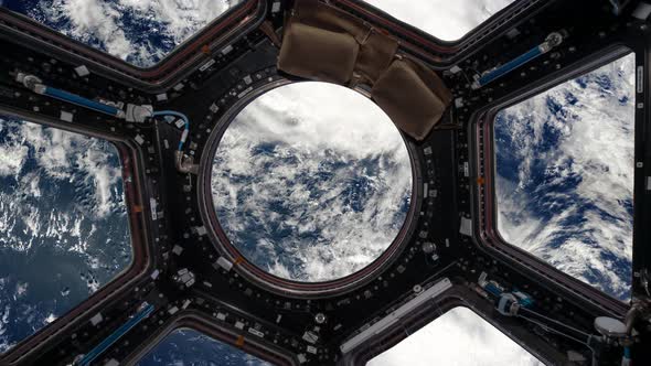 View From the Porthole of the Space Station on Planet Earth, Stock Footage