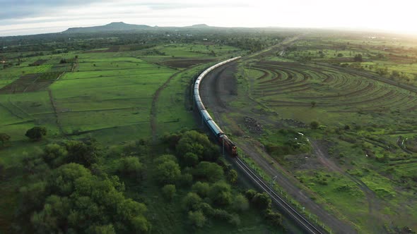 Aerial View, Passenger Train Moving Through Rural Pune In India, Stock ...