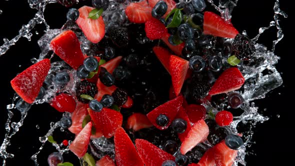 Super Slow Motion Shot of Rotating Exploded Berries Fruit with ...