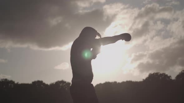 Young Man Shadow Boxing On Summers Evening In Park, Stock Footage ...