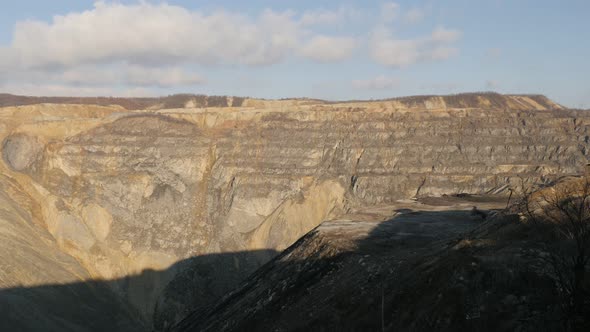 Layers of open-pit mine soil 4K 2160p 30fps UltraHD tilting footage ...