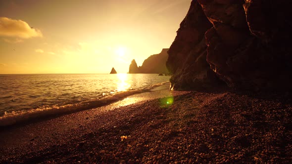 View From the Stone Cave on the Sunset Sea and the Beach the Volcanic ...