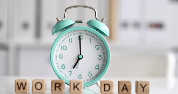 Text Working Day and Alarm Clock at Seven O'clock on Desktop, Stock Footage