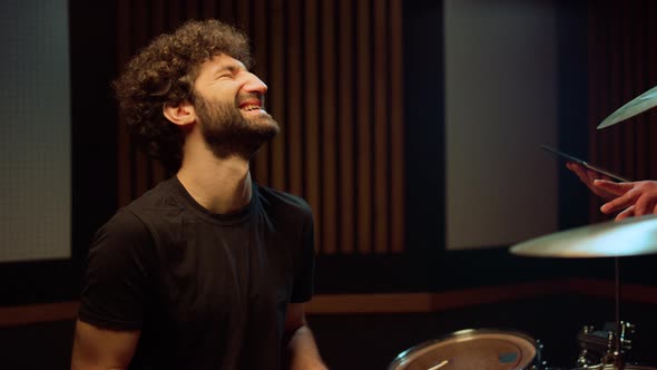 Cheerful Musician Man Laughing in Studio. Smiling Drummer Speaking in ...
