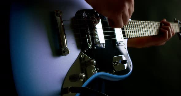 Male Guitarist Plug in Electric Guitar, Stock Footage | VideoHive