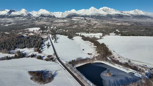 Aerial view of the pond in Strba and the High Tatras in Slovakia, Stock ...