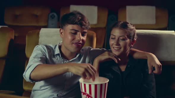 Men and Women are Eating and Tossing Popcorn, Stock Footage | VideoHive