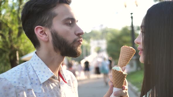 Couple in Love Eating Ice Cream and Kissing, Stock Footage | VideoHive