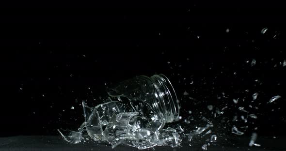 Pot Falling and exploding on Black Background, Slow Motion 4K, Stock ...