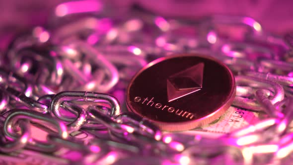 Cryptocurrency Etherium ETH Rotate on the Table with Silver Chain As ...