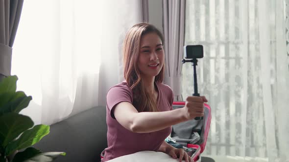 Tourism blogger recording video selfie talk with the audience for a ...