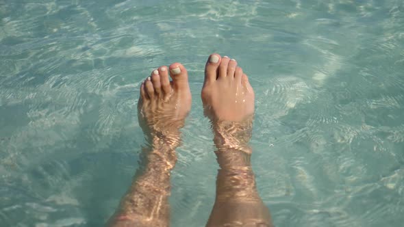 Woman Feet Floating In Turquoise Sea Water On Vacation, Stock Footage
