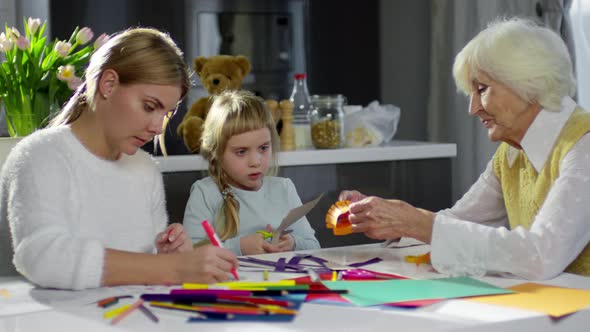 Women Doing Crafts with Little Girl, Stock Footage | VideoHive