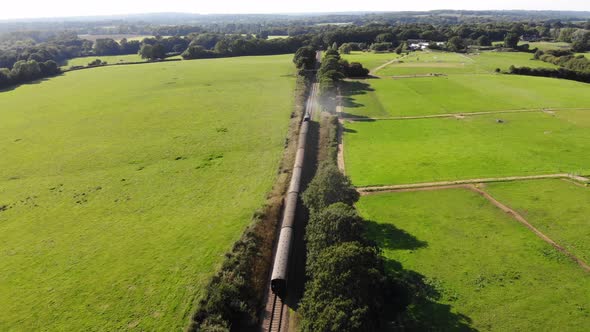 Overhead Aerial View of Stem Train on Vintage Railway Line, England. 4K ...