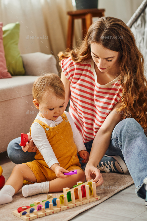 Joyful mother and child bonding Stock Photo by LightFieldStudios ...