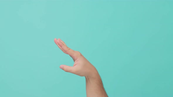 Close up shot of human hand raising stretch out hand flicking off in ...